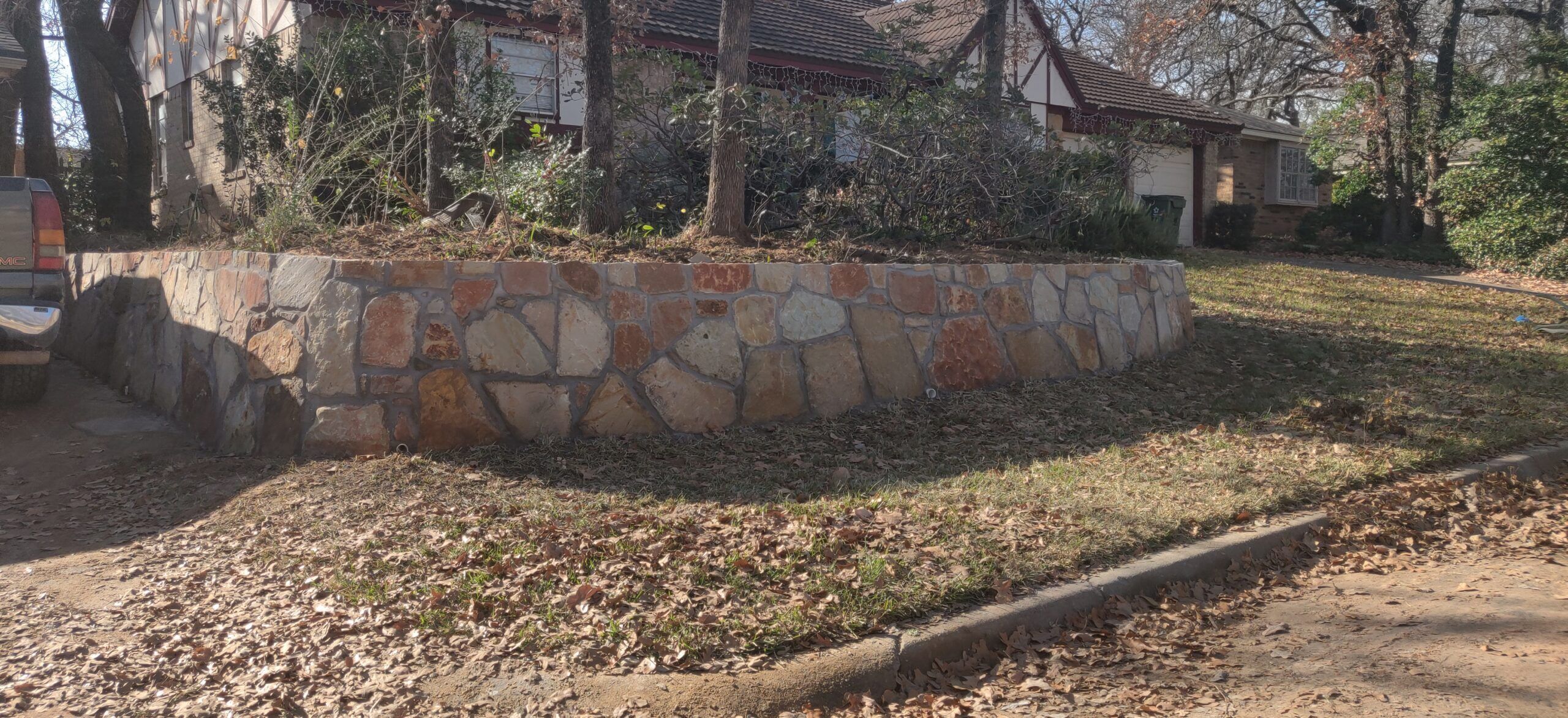 Replaced cross tie retaining wall with Milsap Stone Carrolton, Texas